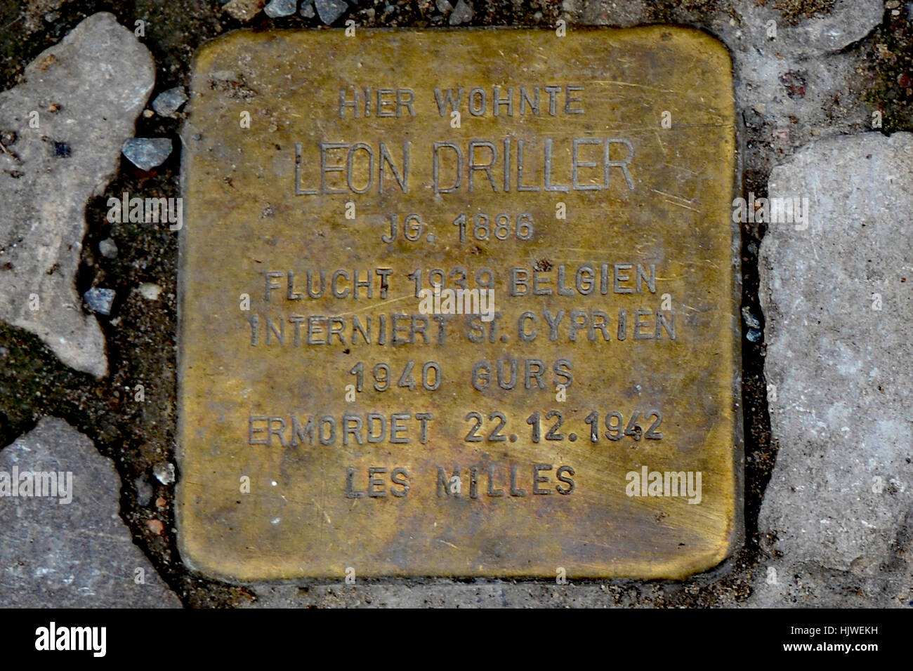 Stolperstein (stumbling stone) on the streets of Berlin. Names of ...