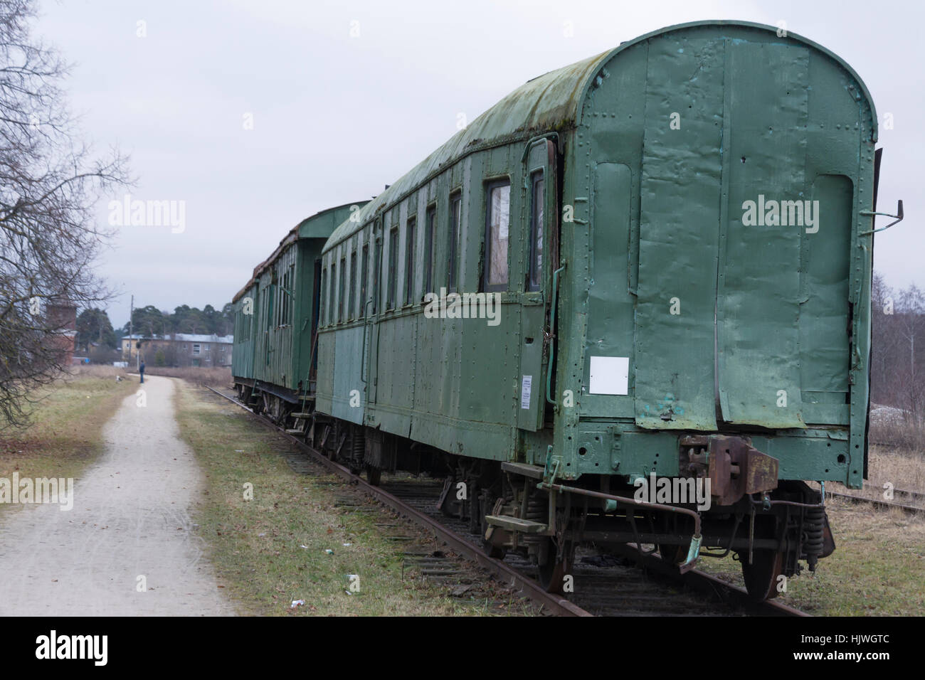 Old green train cars at Haapsalu railway station Stock Photo - Alamy