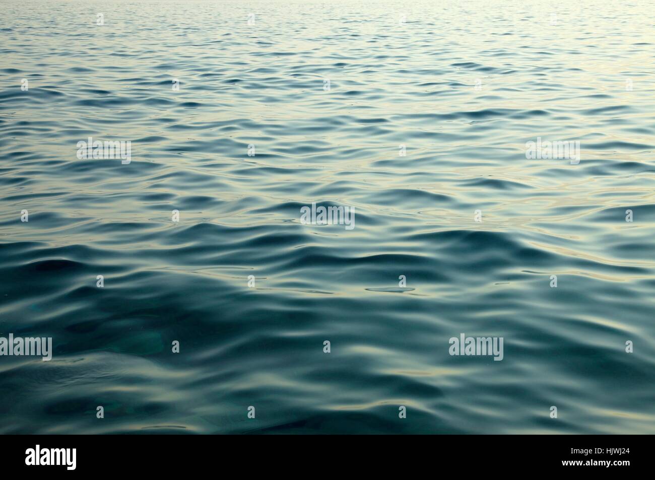 Waving water surface of the sea Stock Photo - Alamy