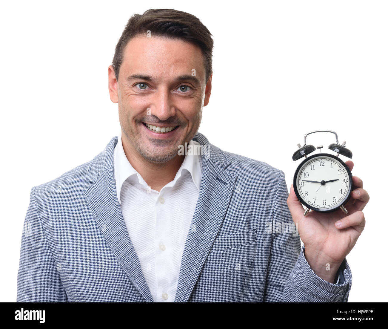 business man holds an alarm clock. Time to work concept. isolated on ...