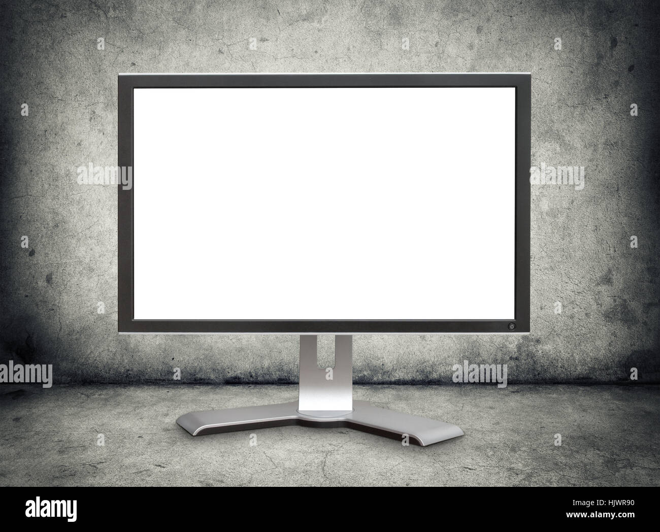 computer monitor with blank screen on grunge concrete floor Stock Photo ...