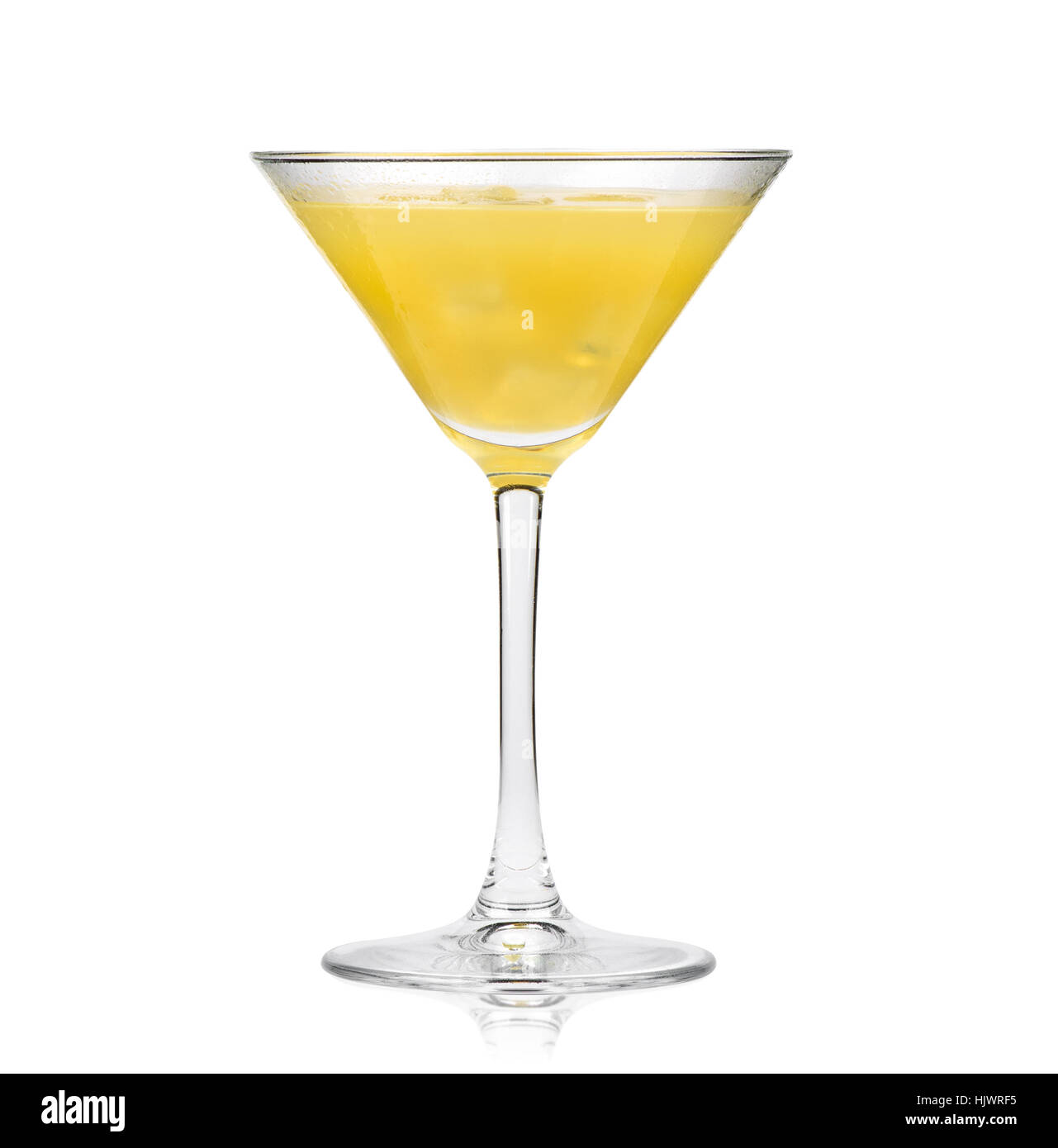 Yellow cocktail in martini glass isolated on a white background Stock ...