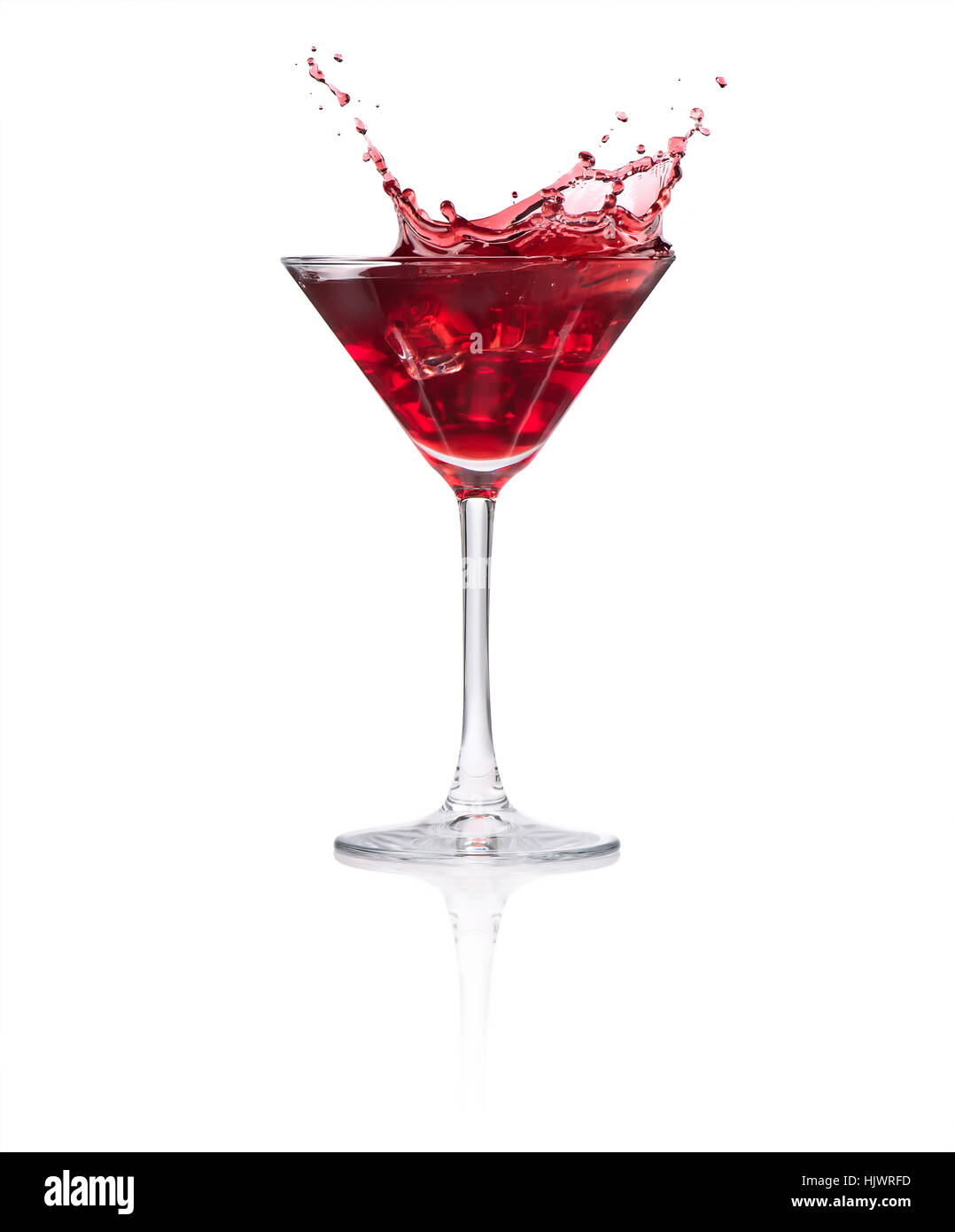 glass of red cocktail splash isolated on white background Stock Photo ...