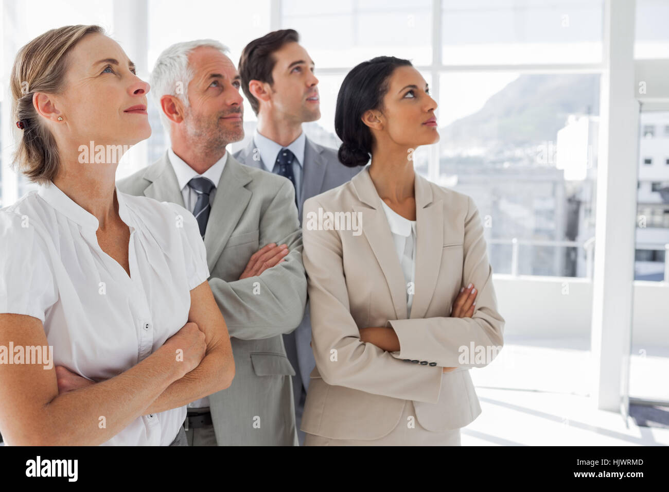 Business people looking at the same way in the workplace Stock Photo ...