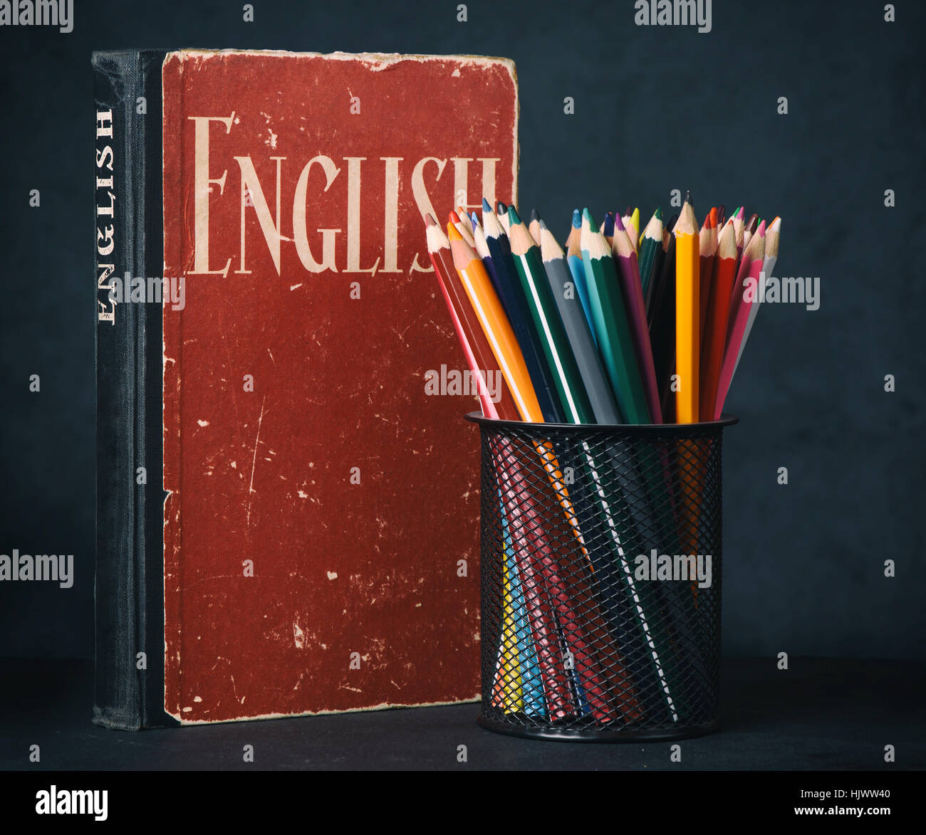 learning english. Education concept. Book with school supplies Stock ...
