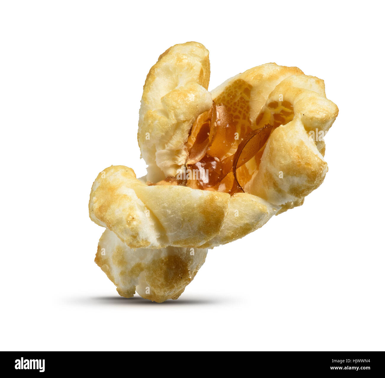 single piece of popcorn isolated on white. Macro Stock Photo - Alamy