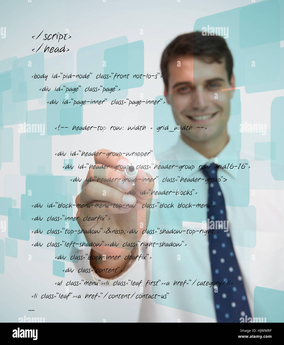 Smiling businessman writing sql language on white background Stock ...