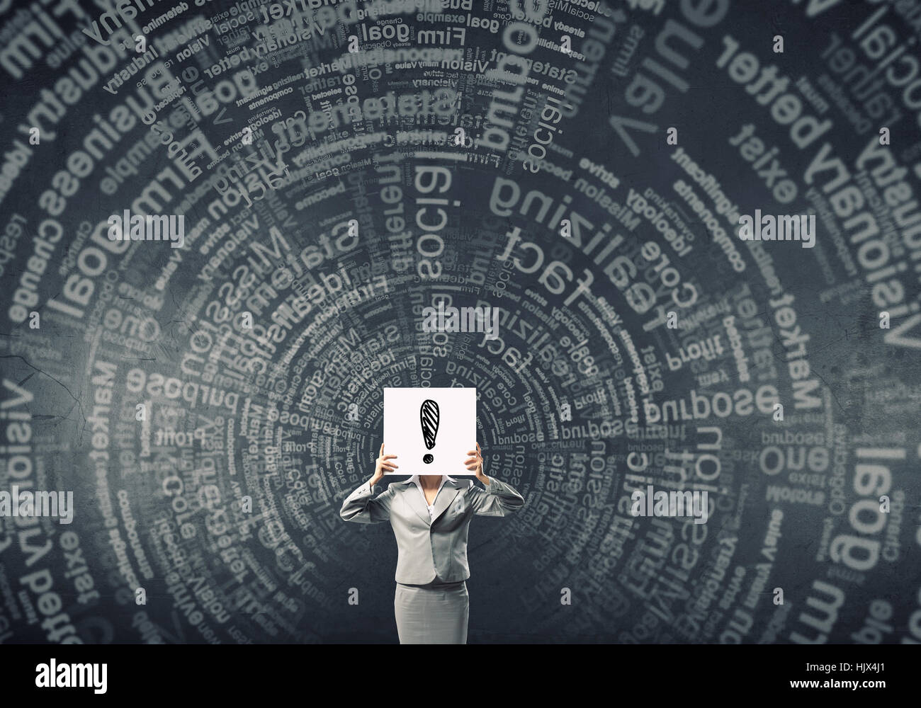 Businesswoman hiding her face behind paper list hi-res stock ...