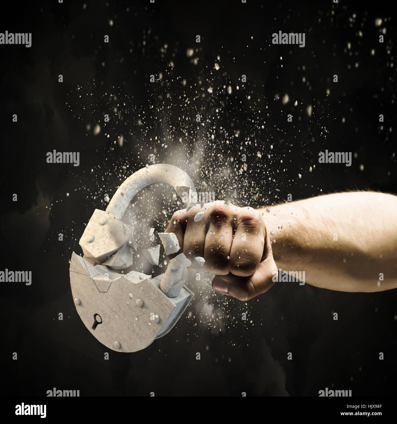 Image of human hand breaking stone lock hi-res stock photography and ...