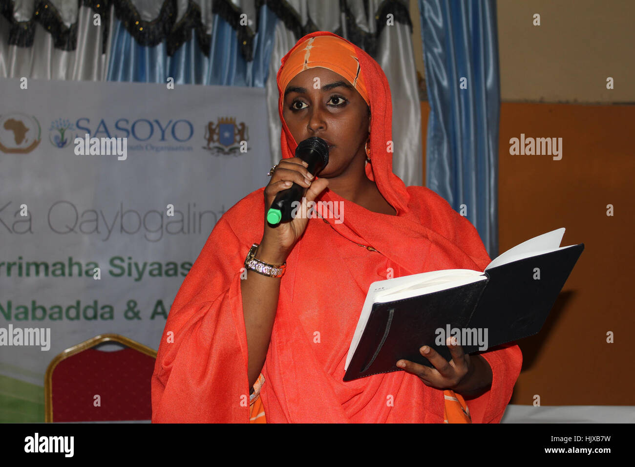 Naima Adan Elmi, chairperson of the Save Somali Youth Organization, speaks at a workshop in ...