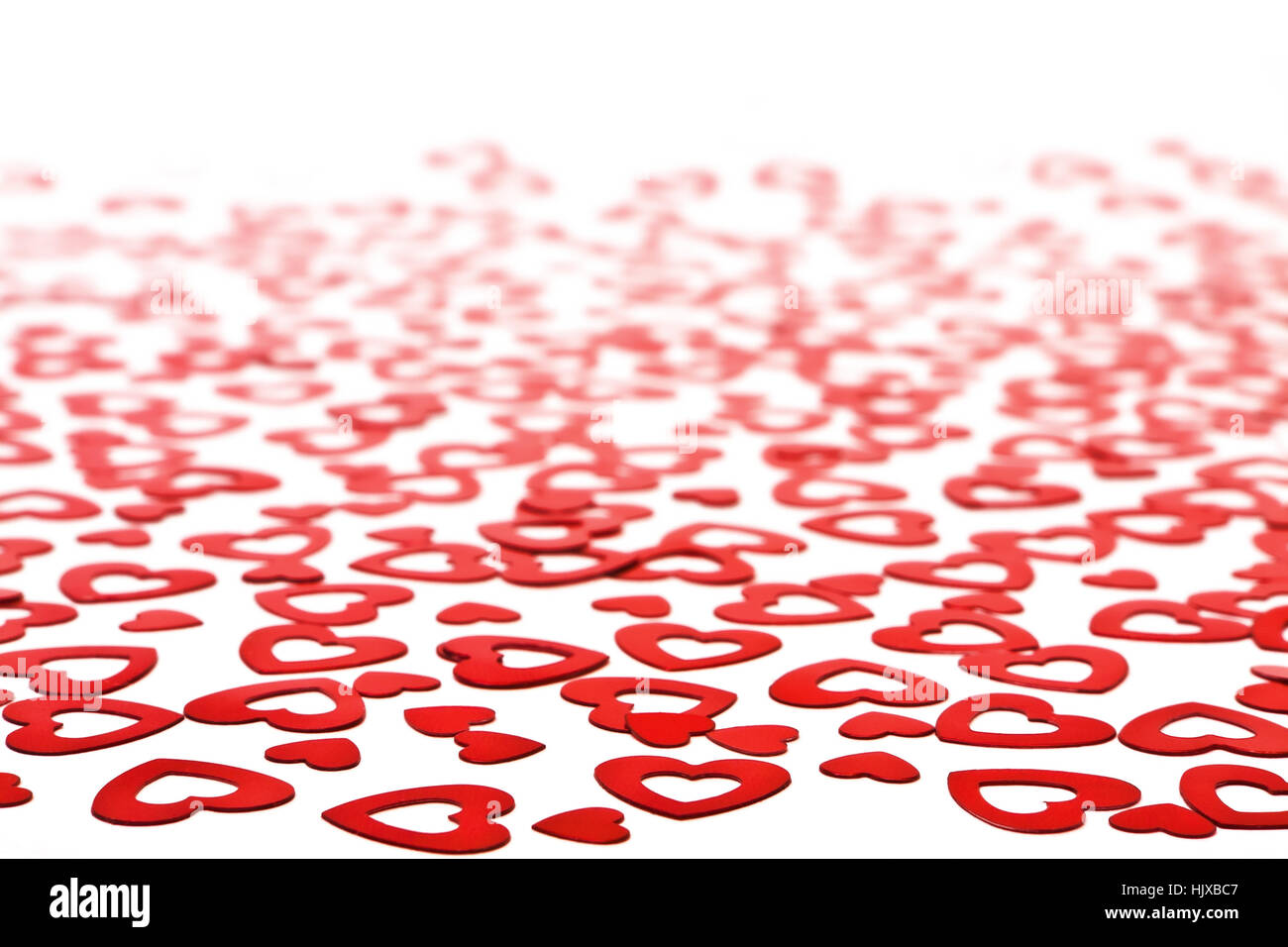 Scattered hearts isolated on white Stock Photo - Alamy