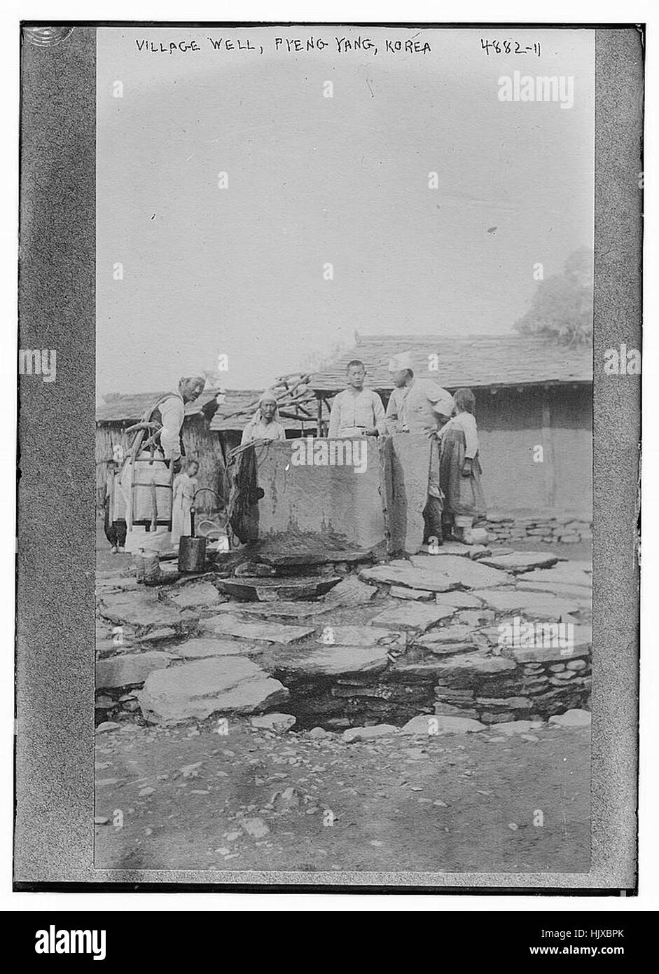 A vintage photograph capturing the village well in Pyeng Yang, Korea ...