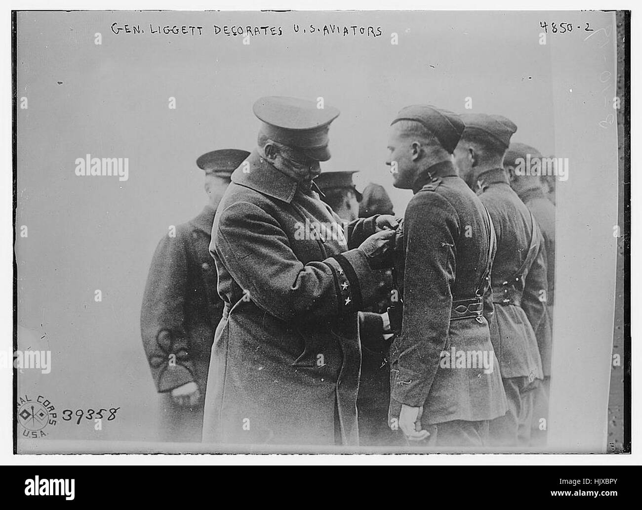 Gen Liggett decorates US aviators in a historic photograph Stock Photo ...