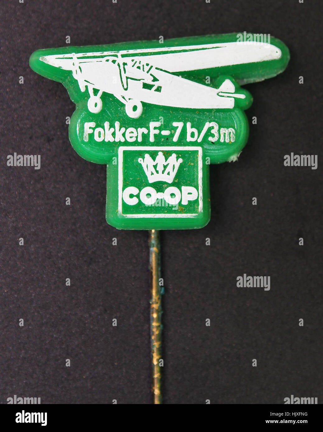 A vintage advertising pin for the Co-Op Fokker F7, an iconic Dutch ...