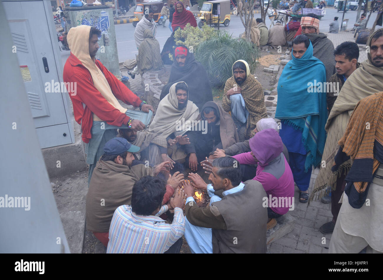 Lahore, Pakistan. 24th Jan, 2017. Pakistani people busy in their ...