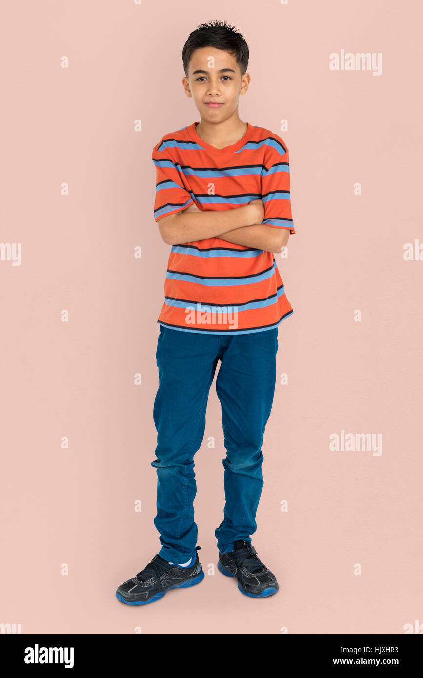 Kid Pose Standing Studio Concept Stock Photo - Alamy