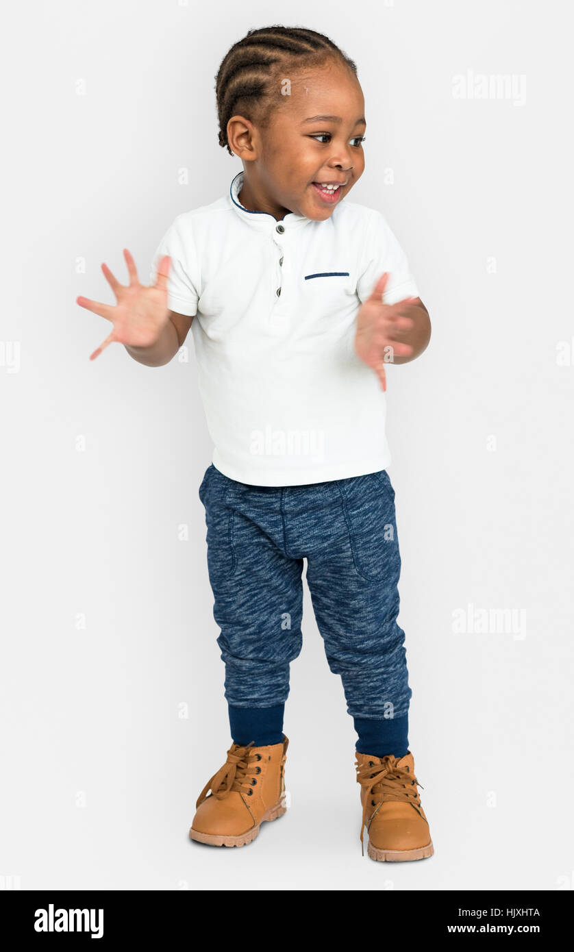 Kid Pose Standing Studio Concept Stock Photo - Alamy