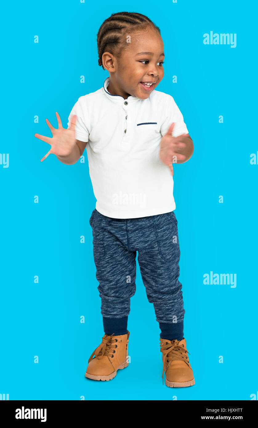 Kid Pose Standing Studio Concept Stock Photo - Alamy