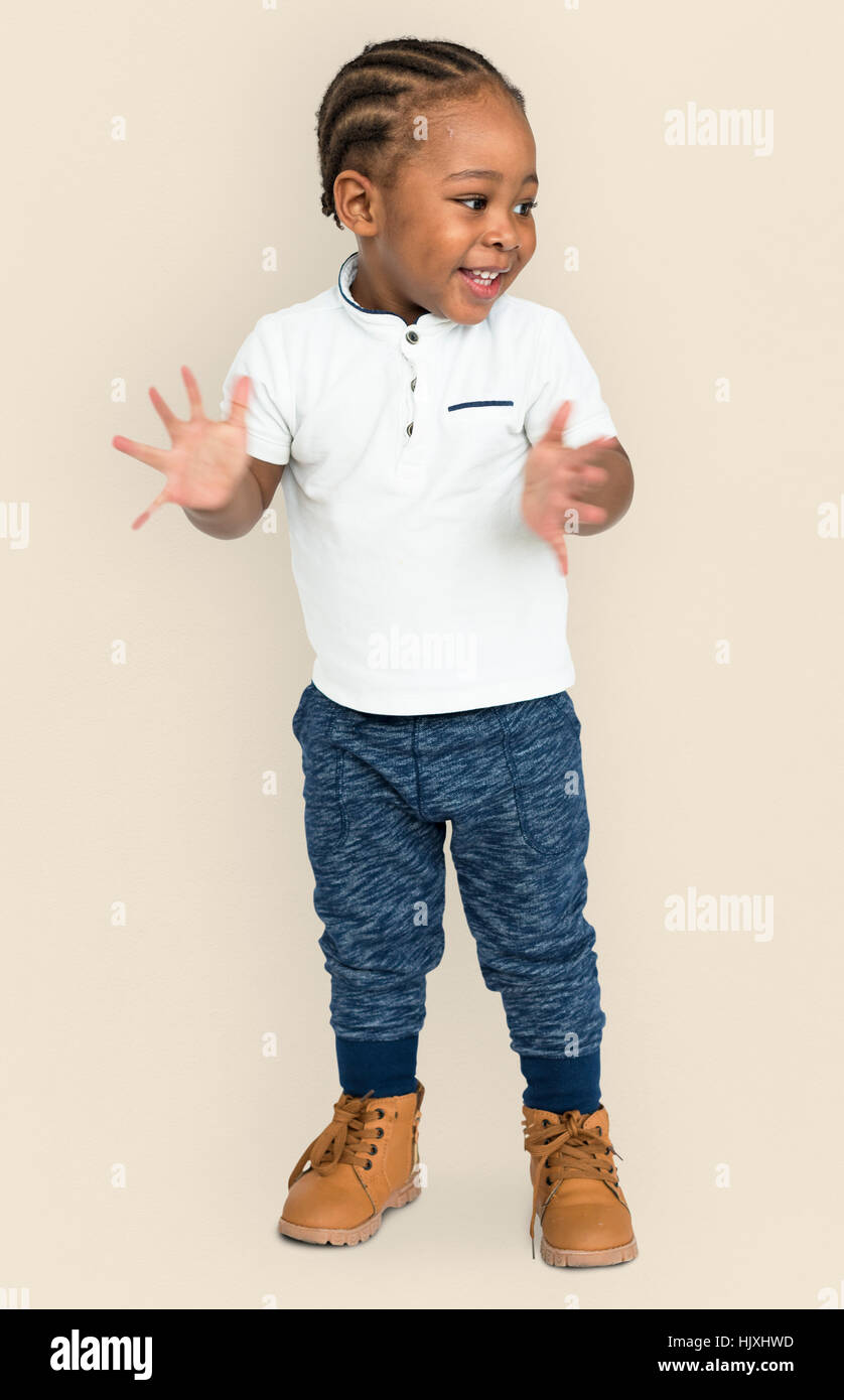 Kid Pose Standing Studio Concept Stock Photo - Alamy