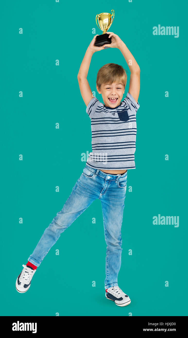 Boy Won Award Reward Cup Prize Concept Stock Photo - Alamy
