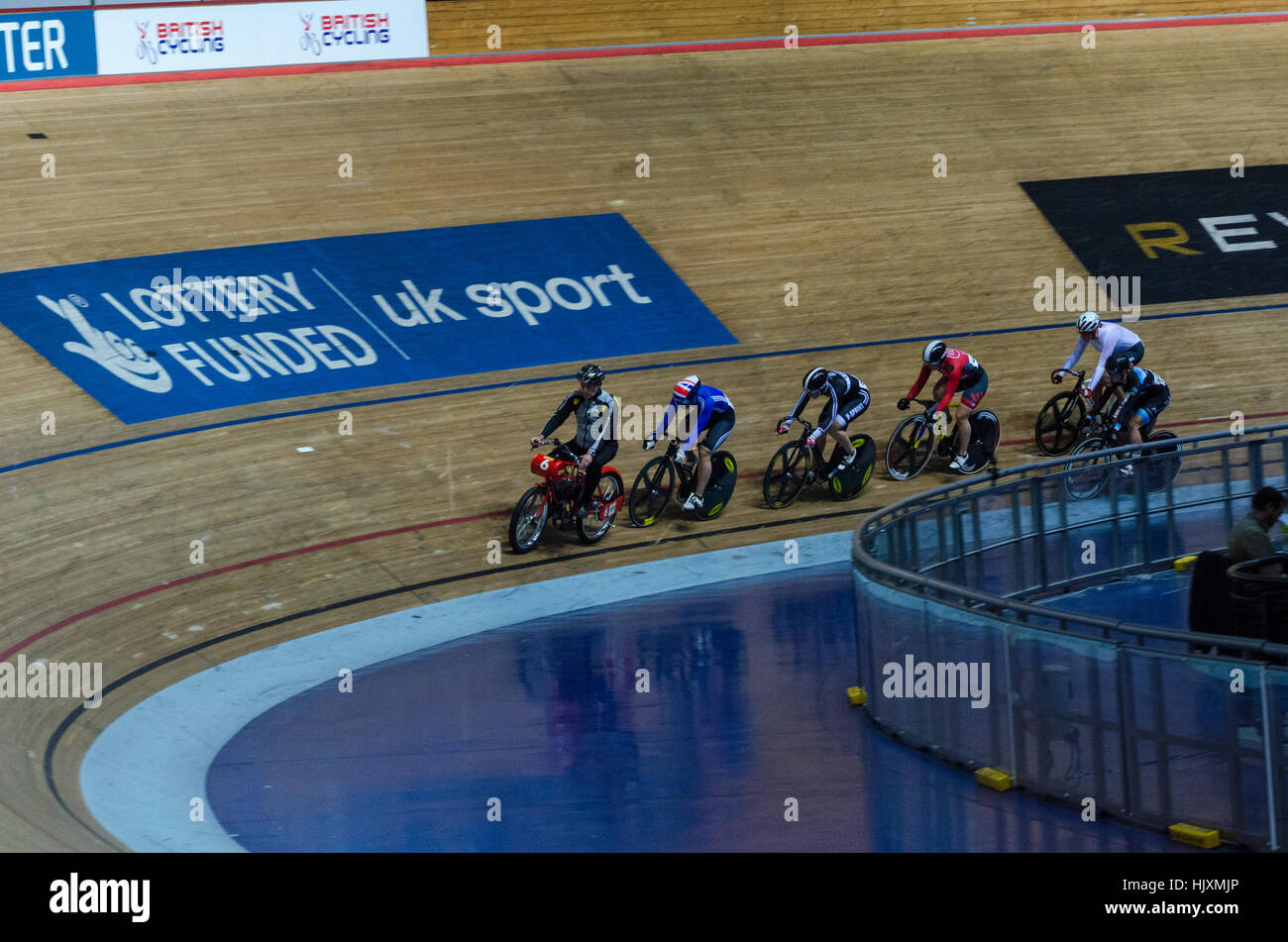 Cyclists follow the derny bike during the Keirin race at the National ...