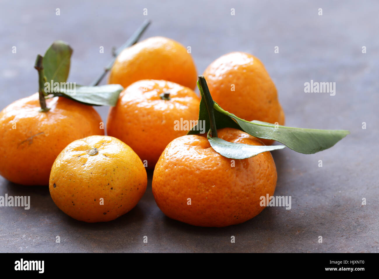 natural fresh tangerines on the table Stock Photo - Alamy