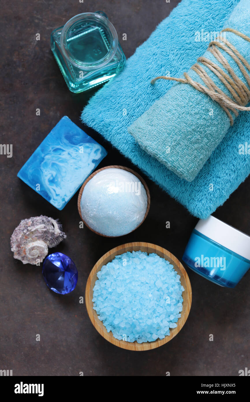 Spa concept turquoise - soap, salt, cream, towel Stock Photo - Alamy