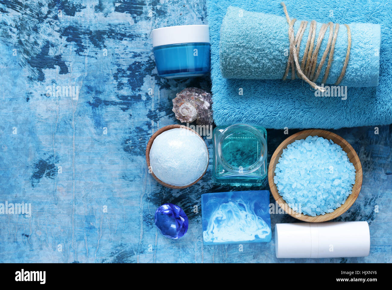 Spa concept turquoise - soap, salt, cream, towel Stock Photo - Alamy