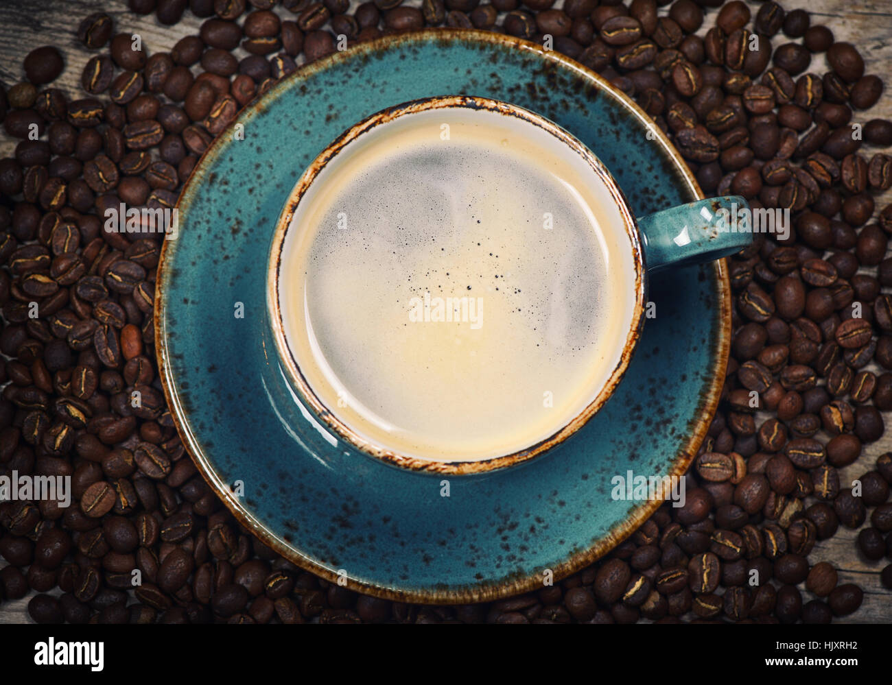 close up of Coffee cup and beans. Top view Stock Photo - Alamy