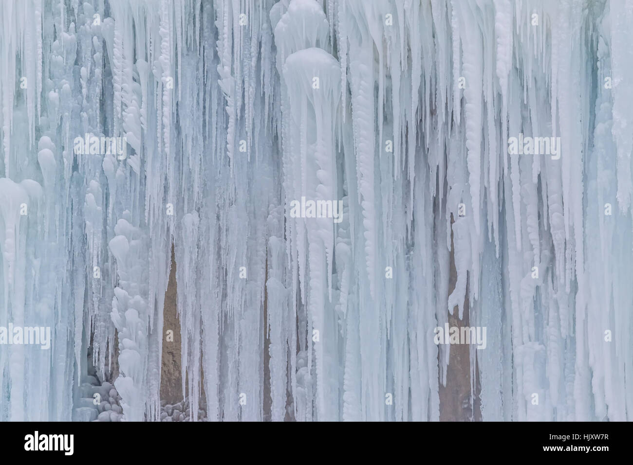 Frozen waterfall background Stock Photo - Alamy