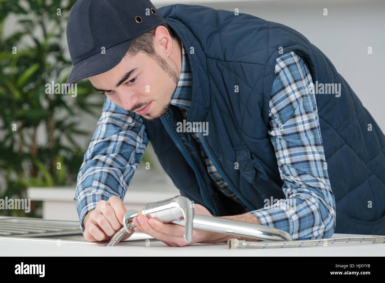 Plumber fitting tap Stock Photo - Alamy