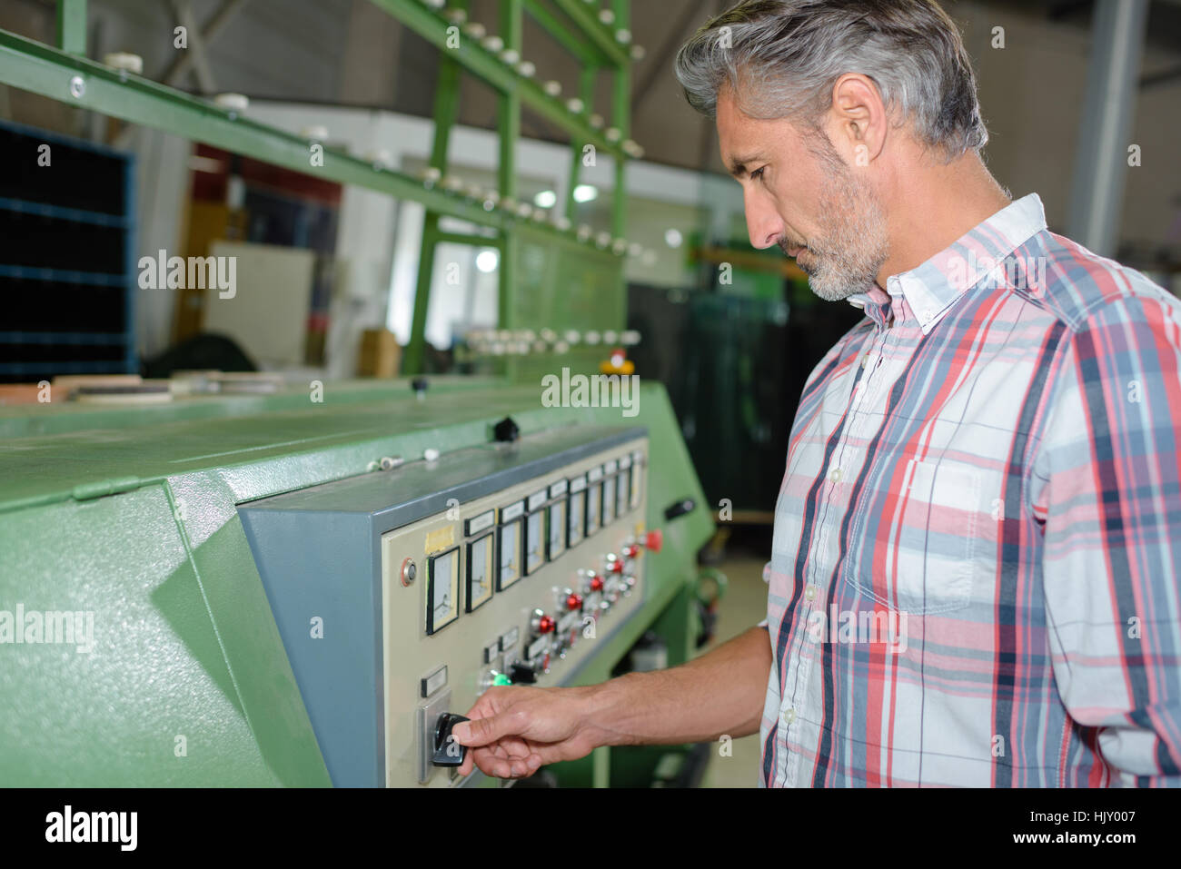 Factory production controls hi-res stock photography and images - Alamy