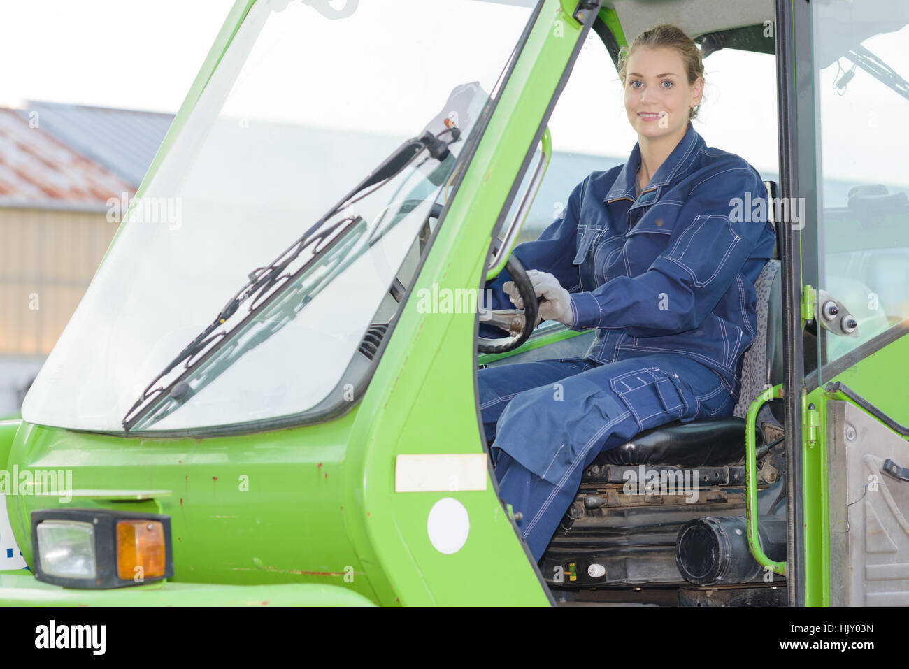 woman operating crane Stock Photo - Alamy