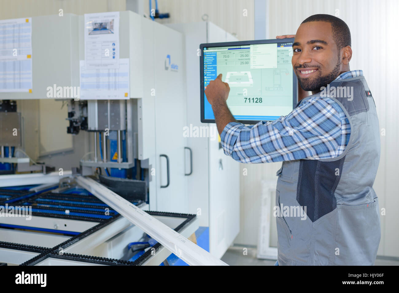 worker tapping the screen Stock Photo - Alamy