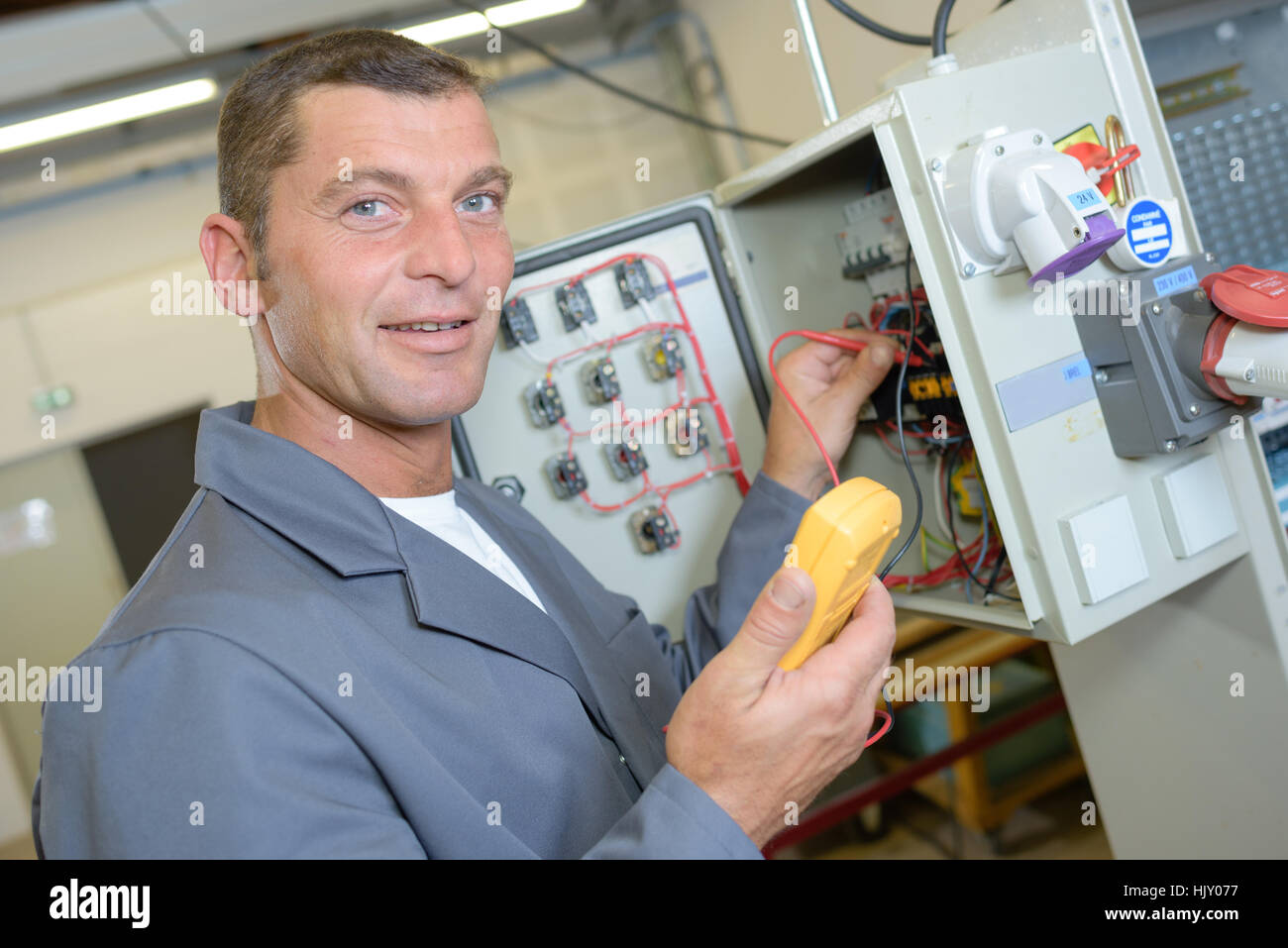 Man reading an electric meter hi-res stock photography and images - Alamy