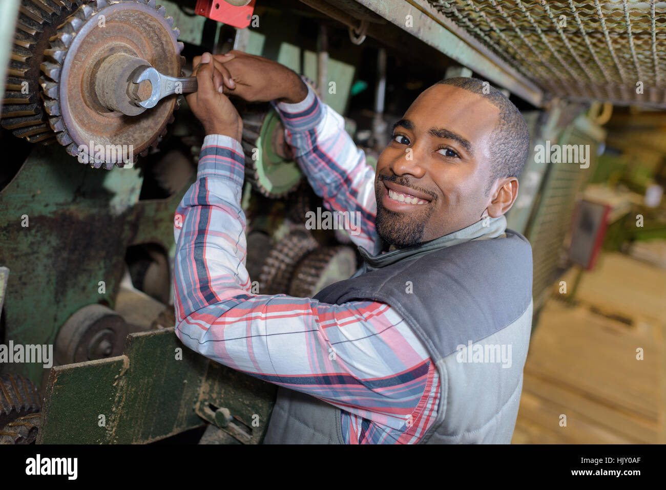 fixing a machinery Stock Photo - Alamy