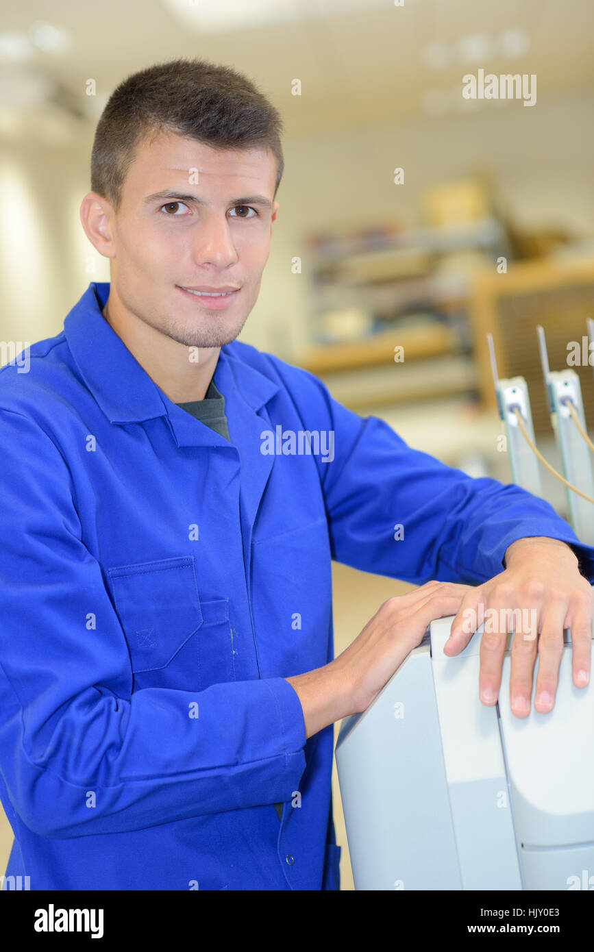 man in work overalls Stock Photo - Alamy