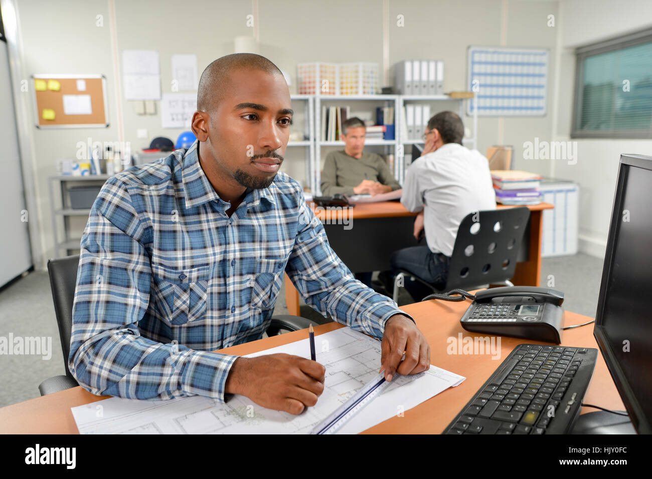 Man working on scale drawings hi-res stock photography and images - Alamy