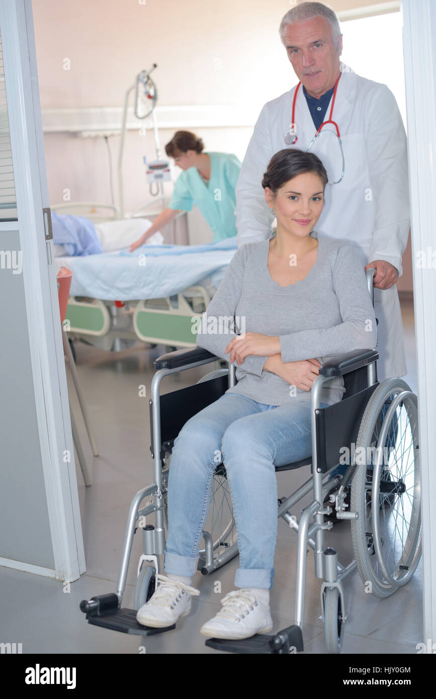 Hospital patient wheelchair movement hi-res stock photography and ...