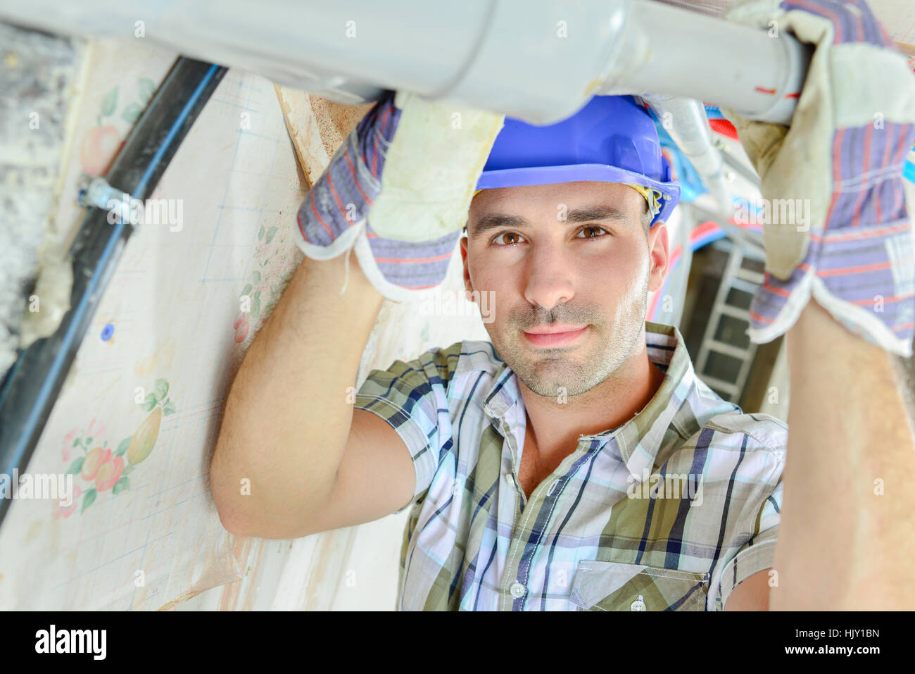 guy holding a water pipe Stock Photo - Alamy