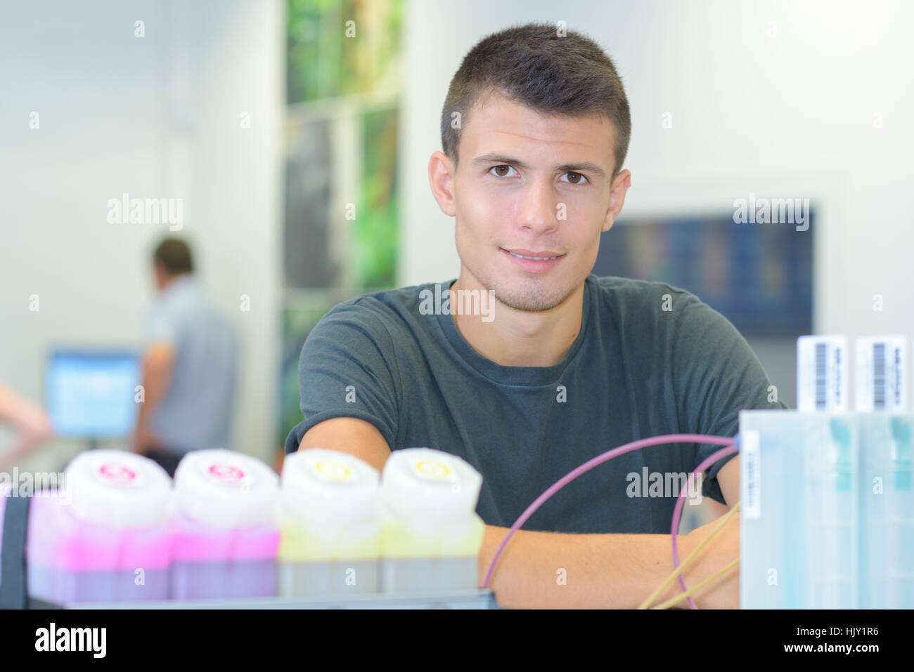 man and ink container Stock Photo - Alamy