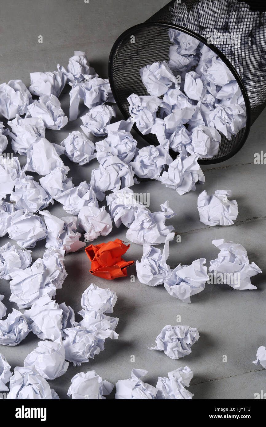 Concept. Creased paper in a trash can Stock Photo - Alamy