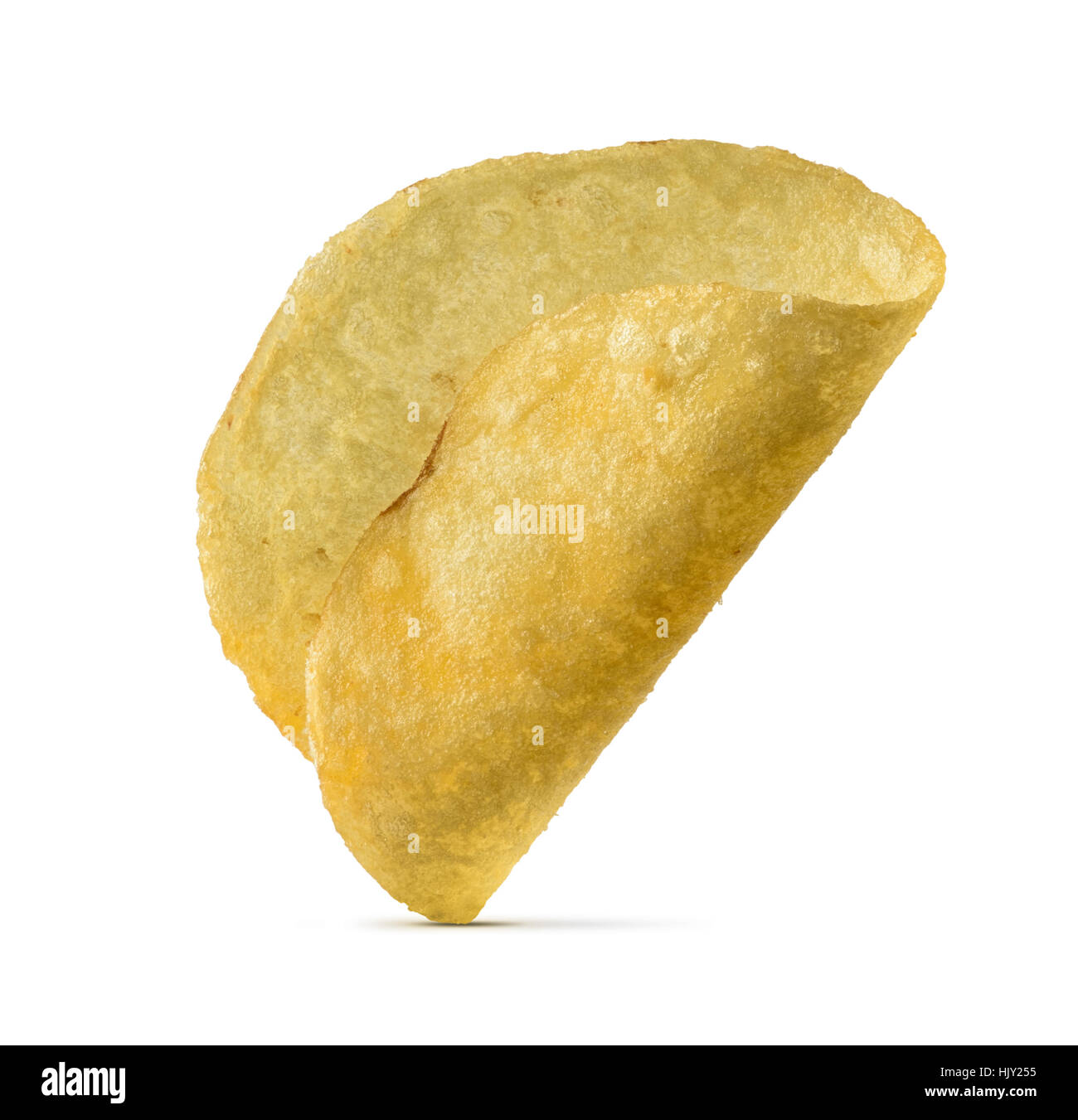 Single potato chip on white background close up Stock Photo - Alamy