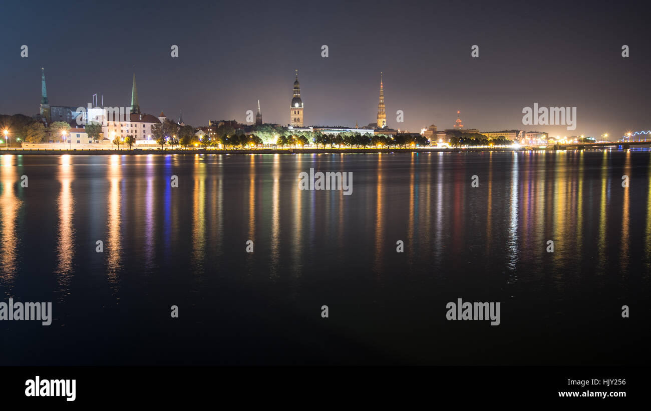 city light reflections over water at the night Stock Photo - Alamy