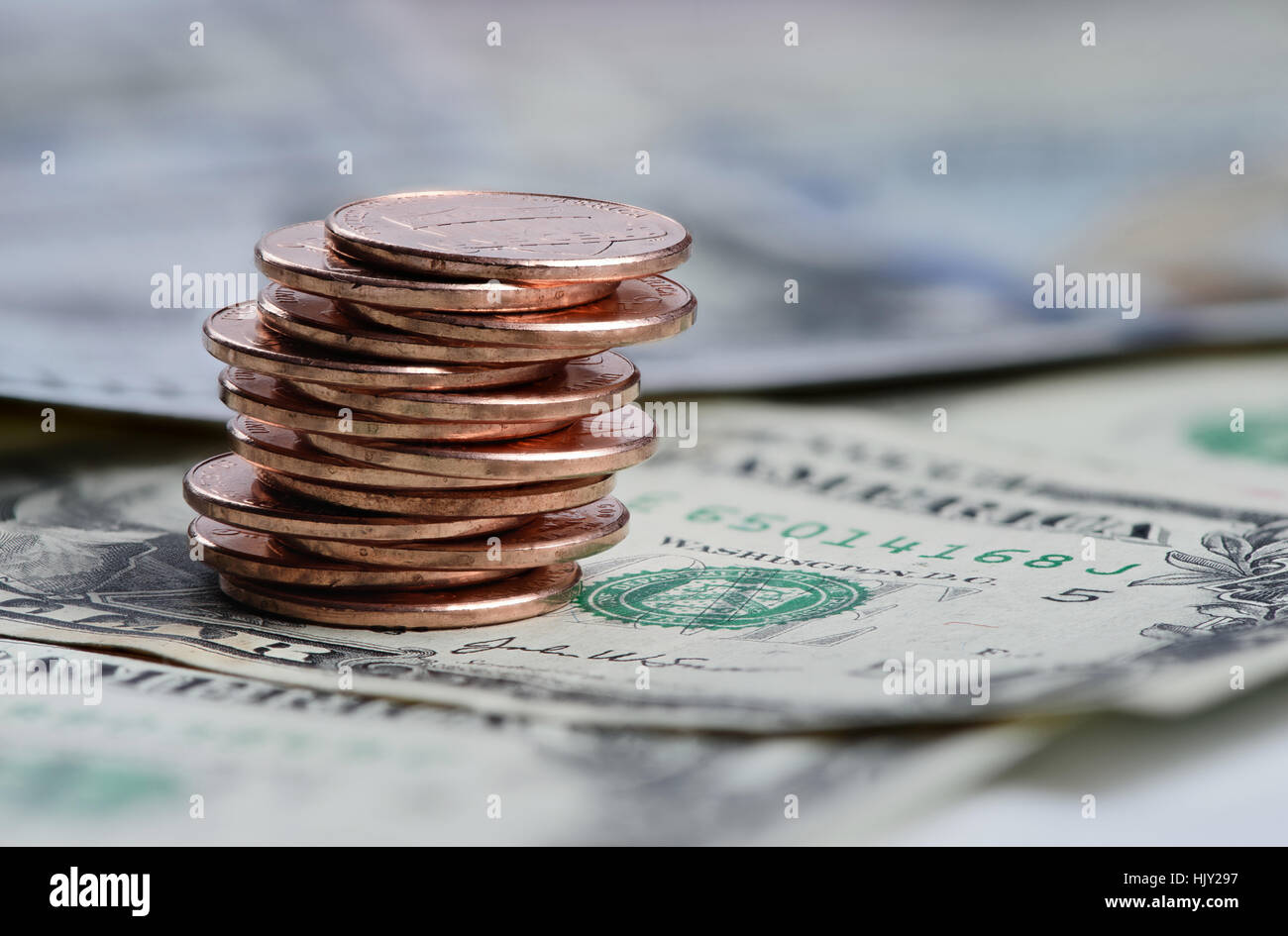 tower of coins and dollars. Financial background Stock Photo - Alamy