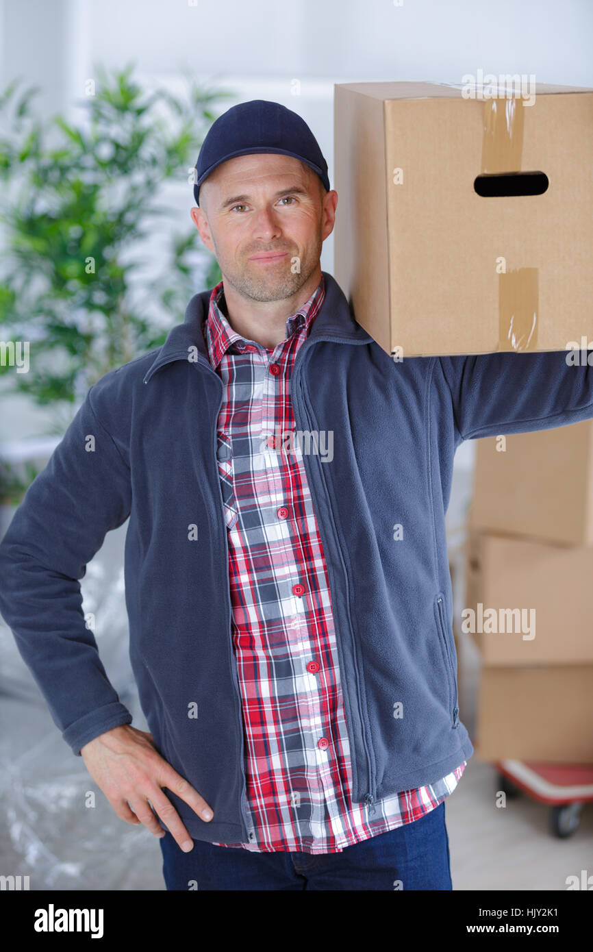 mover carrying box Stock Photo - Alamy