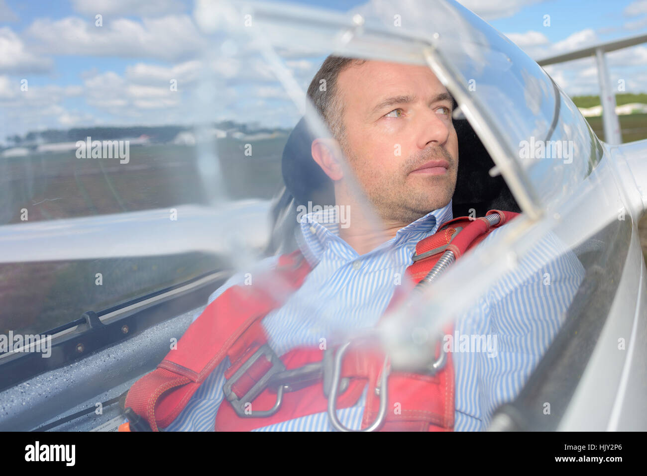 Man in cockpit of glider Stock Photo - Alamy