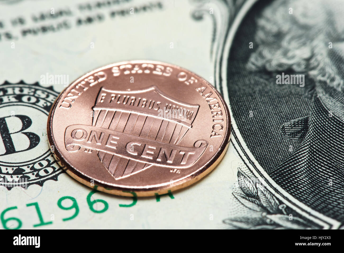 US coin and banknote. One cent close up Stock Photo - Alamy