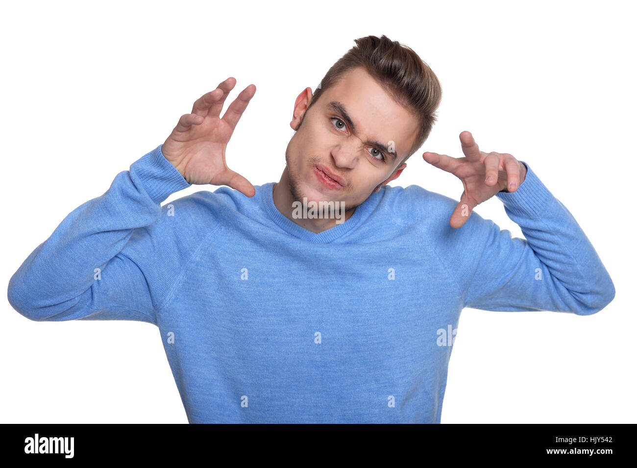 young man making facial expression Stock Photo - Alamy