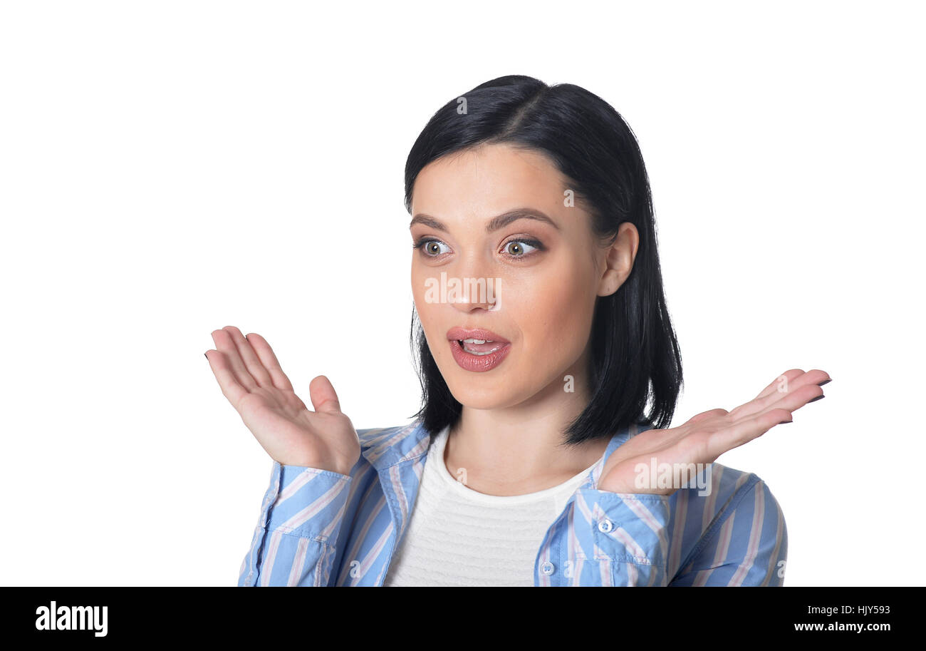 beautiful young woman making facial expression Stock Photo - Alamy